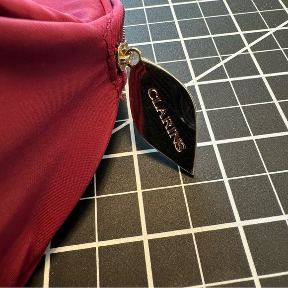 Clarins | Bags | Clarins Cosmetic Makeup Bag Burgundy With Gold Zipper ...